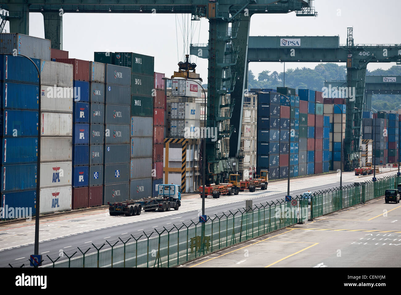 Shipping containers are seen stacked at the Port of Singapore Stock ...