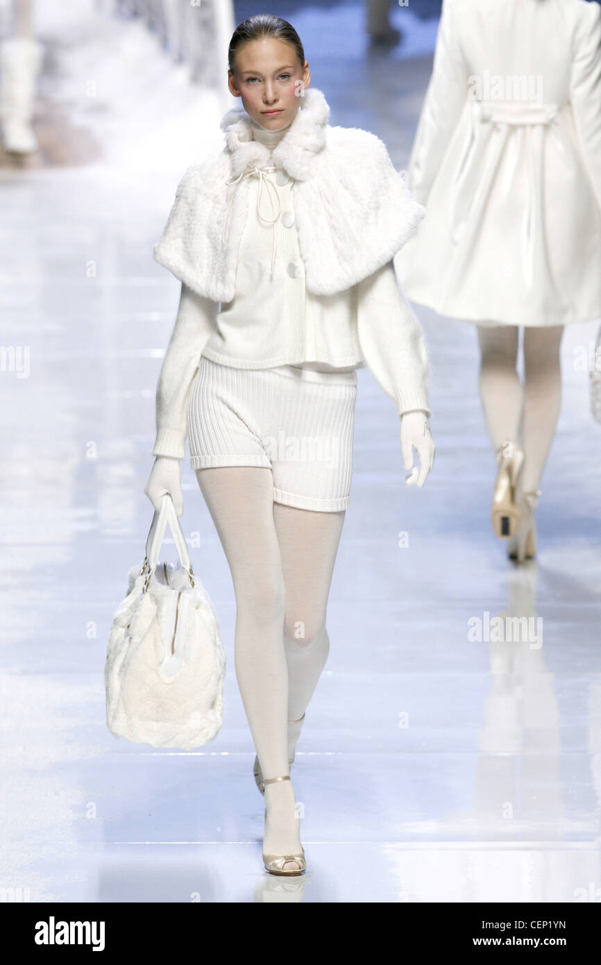 Blu Girl Milan Ready to Wear Autumn Winter Model wearing short white ...