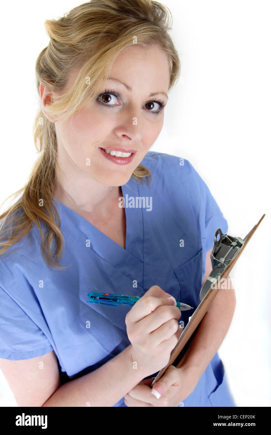 Nurse writing in Chart Stock Photo - Alamy