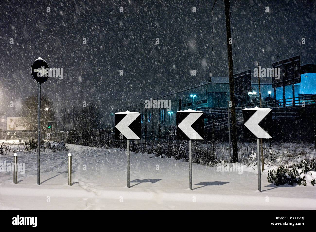 traffic signs on a snowy street in Milan, Italy Stock Photo - Alamy