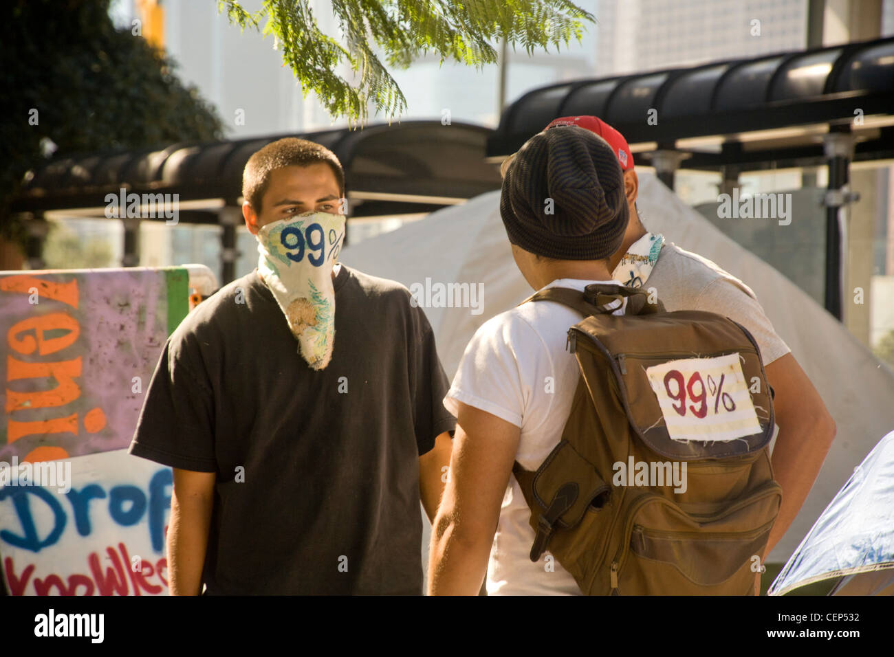 Protesters expressing the We-Are-the-99% anti-capitalism sentiments of ...