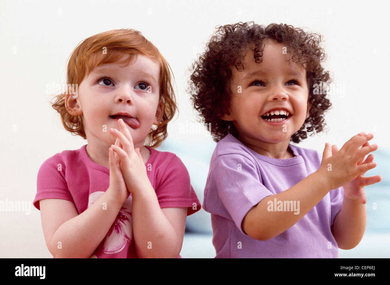 Two female toddlers ginger brunette hi-res stock photography and images ...