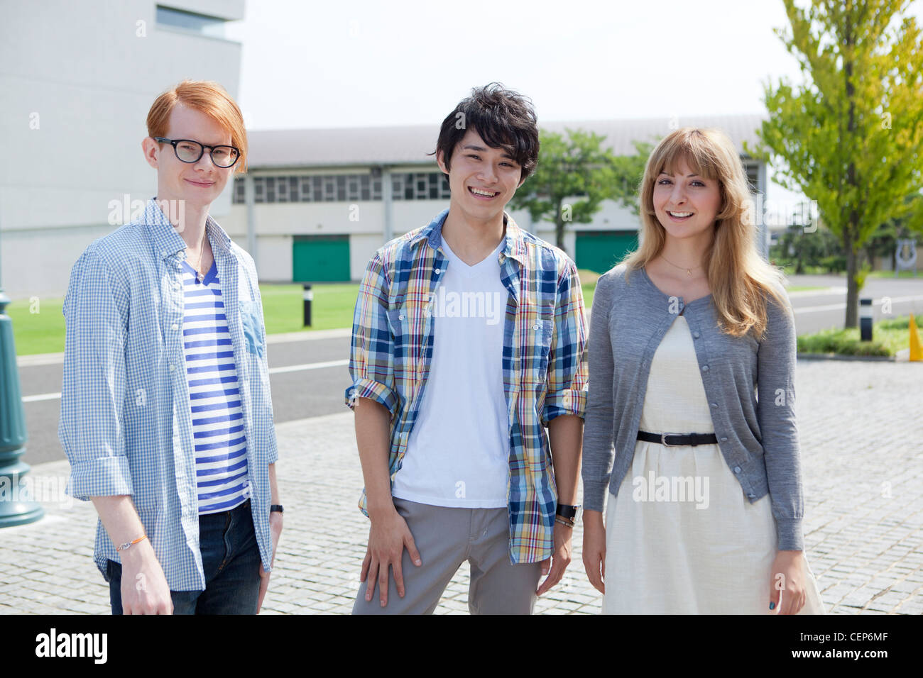 University students standing at campus Stock Photo - Alamy