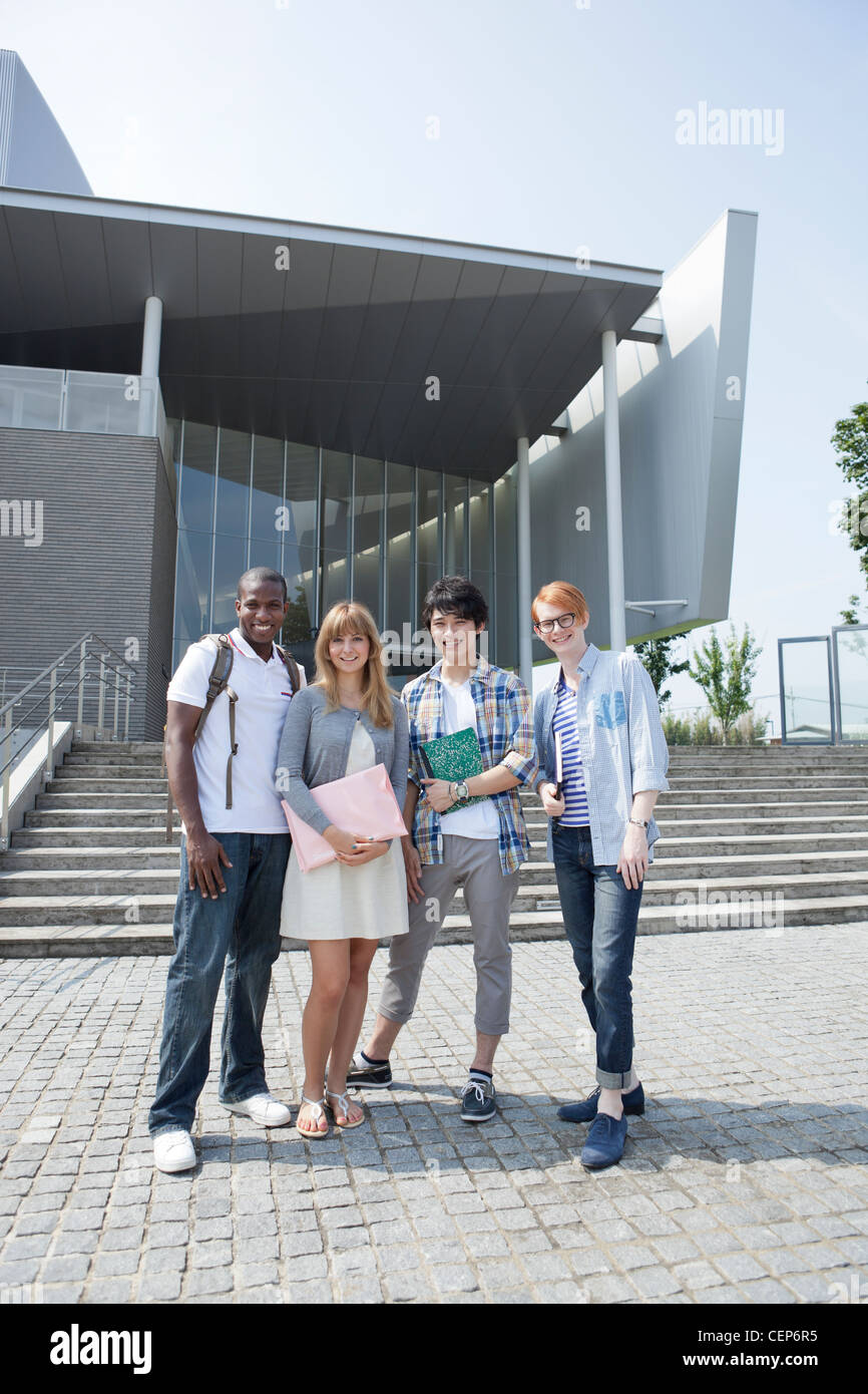 University students standing at campus Stock Photo - Alamy