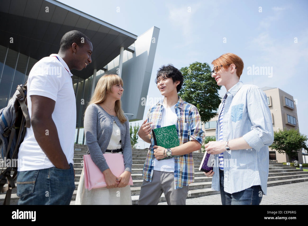 University students talking at campus Stock Photo - Alamy