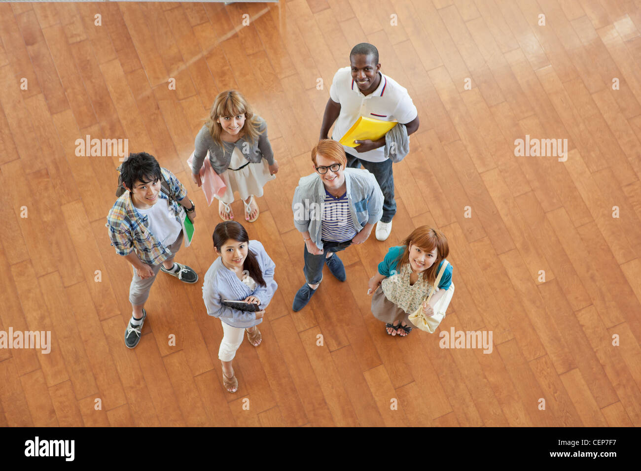 University students standing and looking up Stock Photo - Alamy