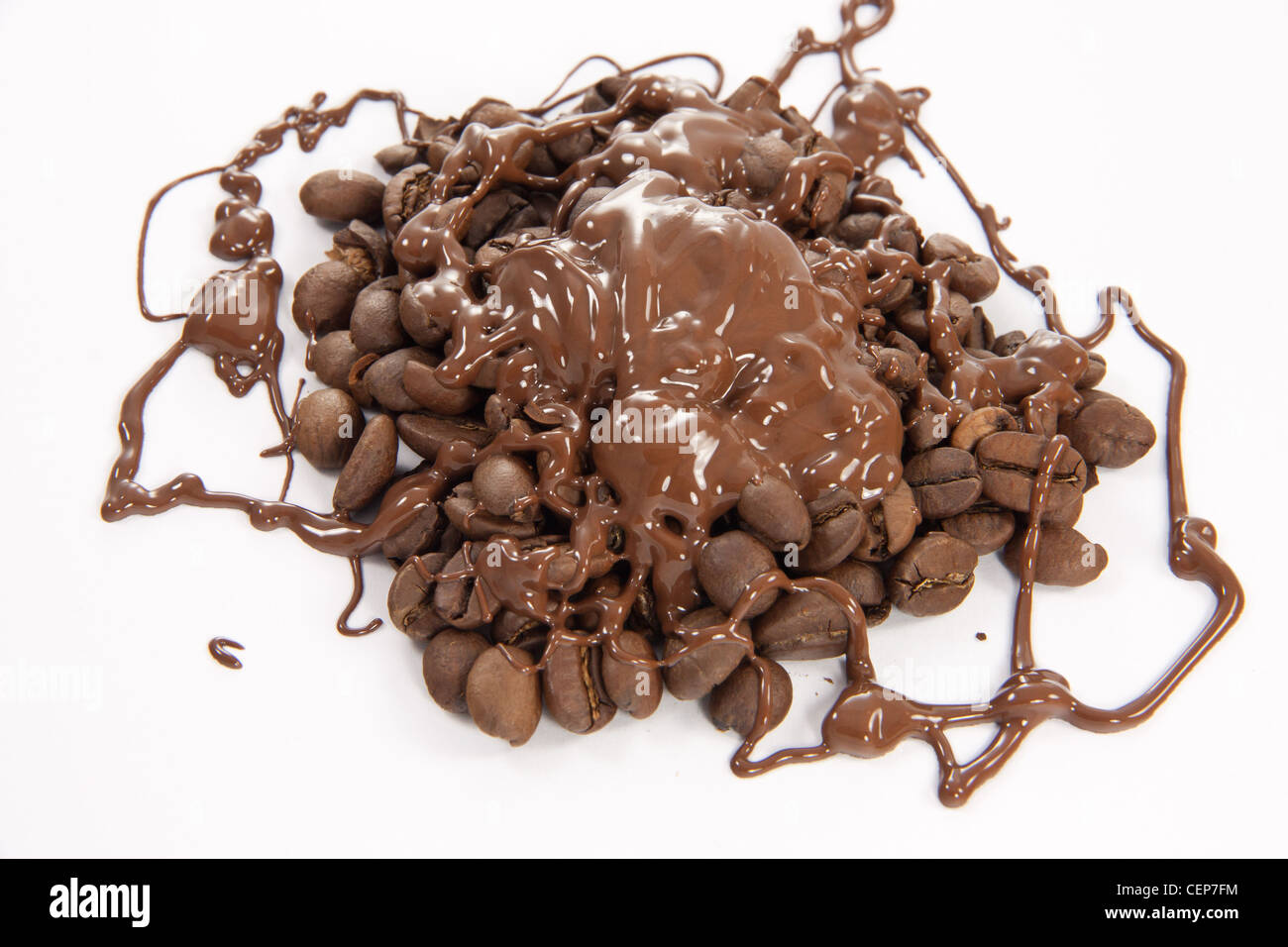 Coffee beans sprayed with melted chocolate Stock Photo - Alamy
