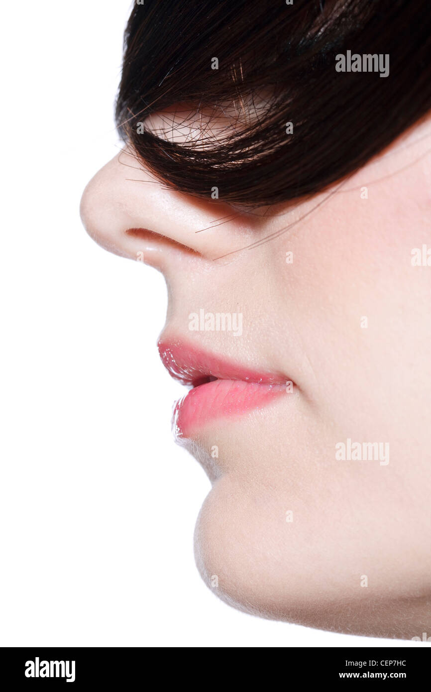 Female with brunette hair covering half of her face Stock Photo - Alamy