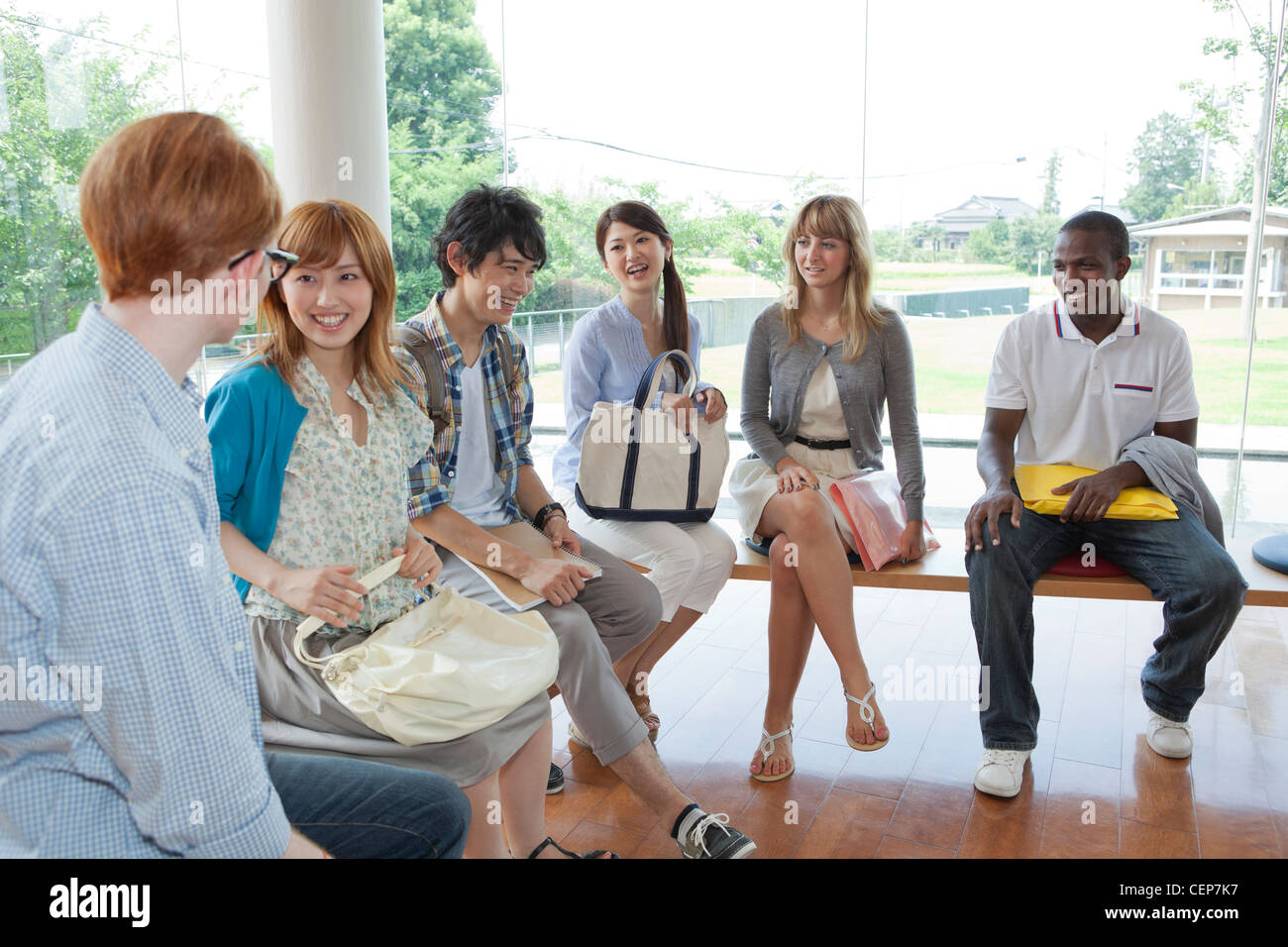University students talking at campus Stock Photo - Alamy