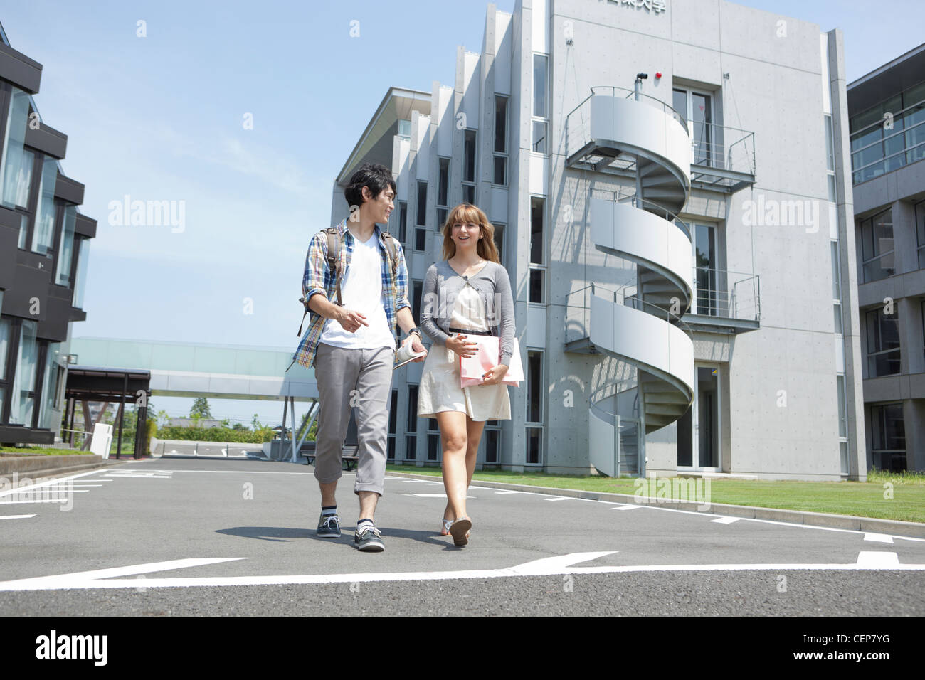 University students walking at campus Stock Photo - Alamy University students walking at campus Stock Photo - Alamy