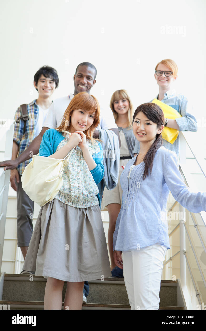 University students standing on stairs Stock Photo - Alamy
