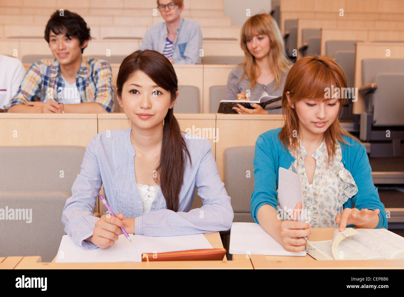 University students studying in lecture theater Stock Photo - Alamy