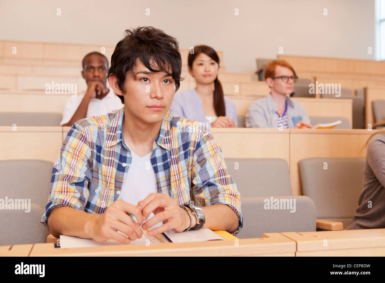 University students studying in lecture theater Stock Photo - Alamy