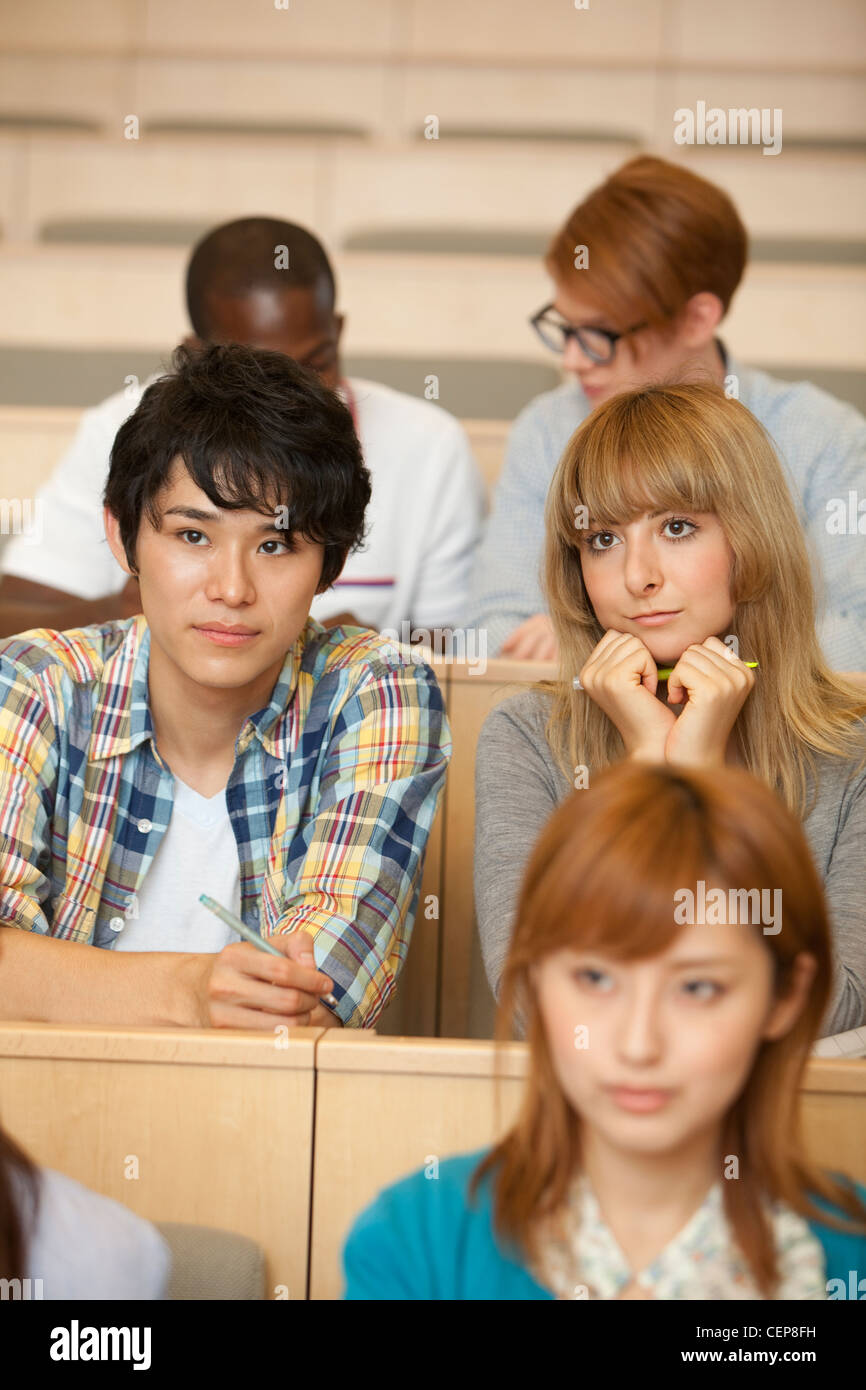 University students studying in lecture theater Stock Photo - Alamy