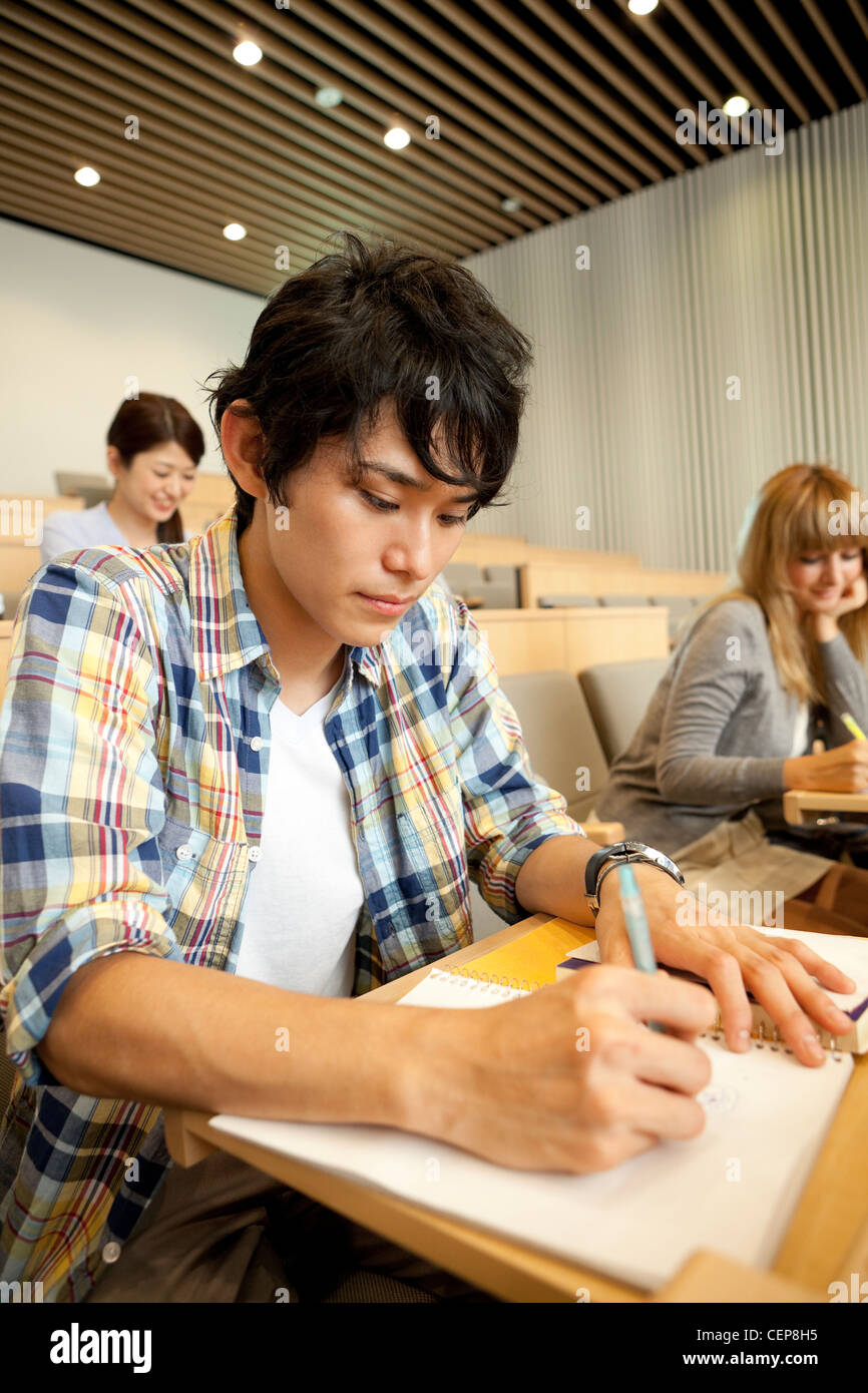 University students studying in lecture theater Stock Photo - Alamy