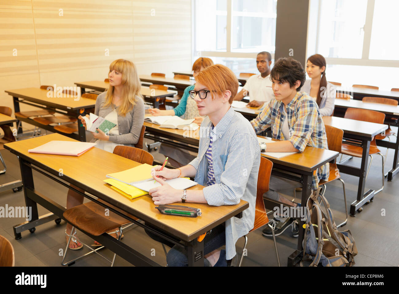 University students studying in classroom Stock Photo - Alamy
