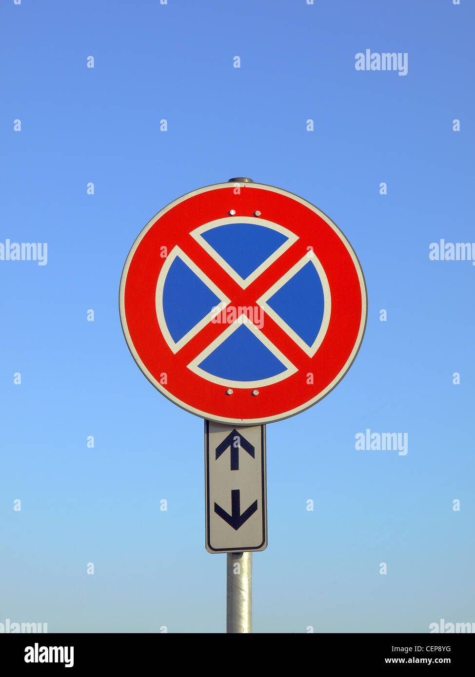 No parking sign isolated over blue sky background Stock Photo - Alamy