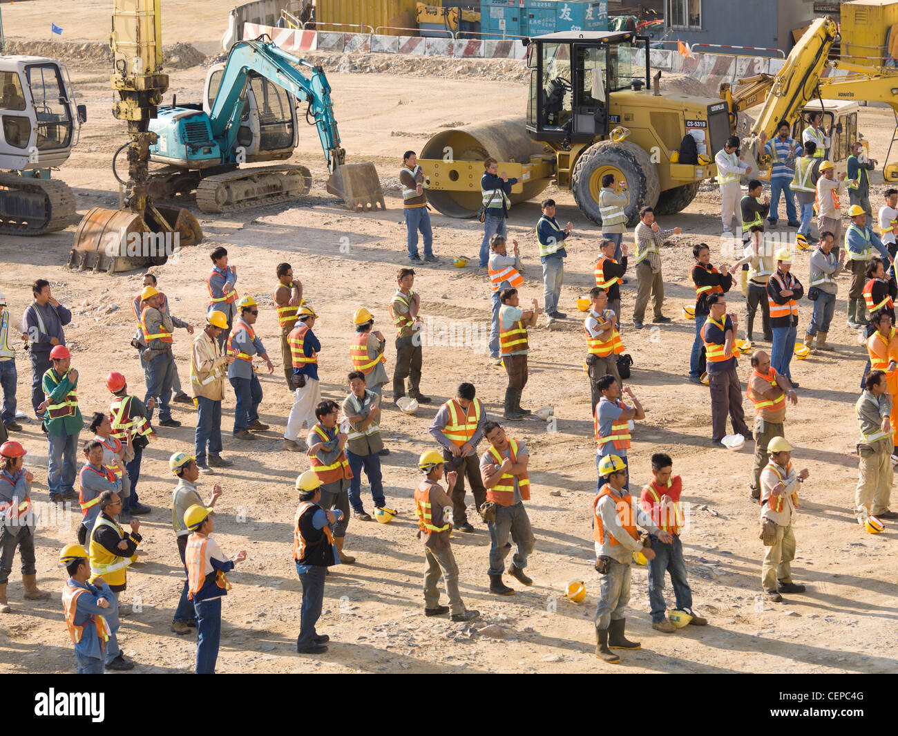 Men On A Construction Site Stock Photo - Alamy