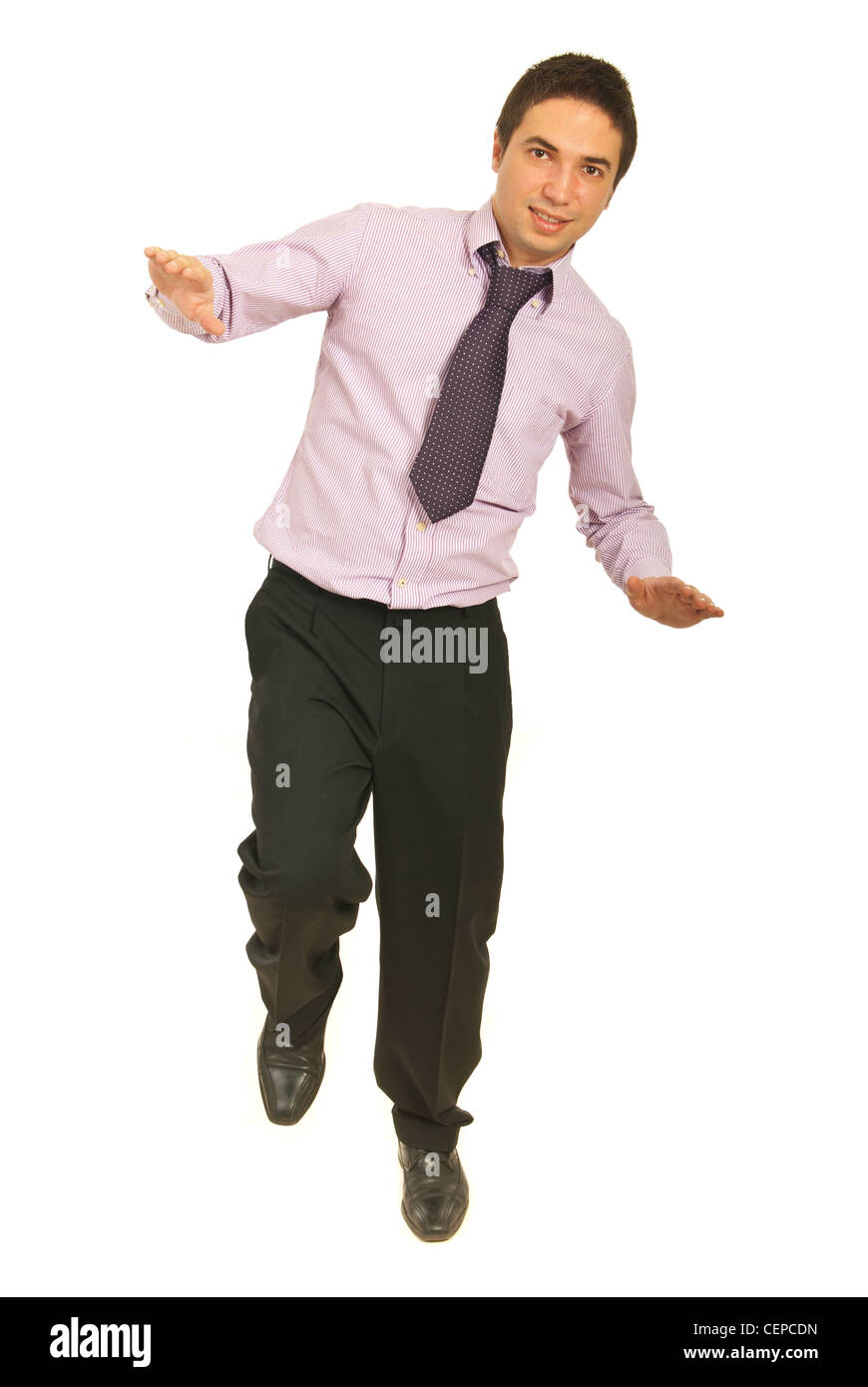 Business man trying to stand in one leg and holding balance isolated on ...