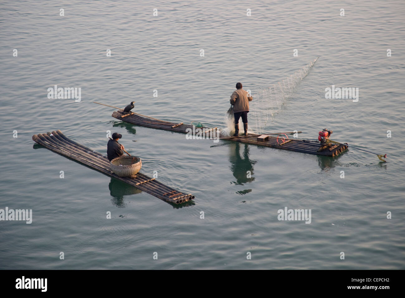 Men On A Raft Fishing; Guangxi Zhuang,China Stock Photo - Alamy