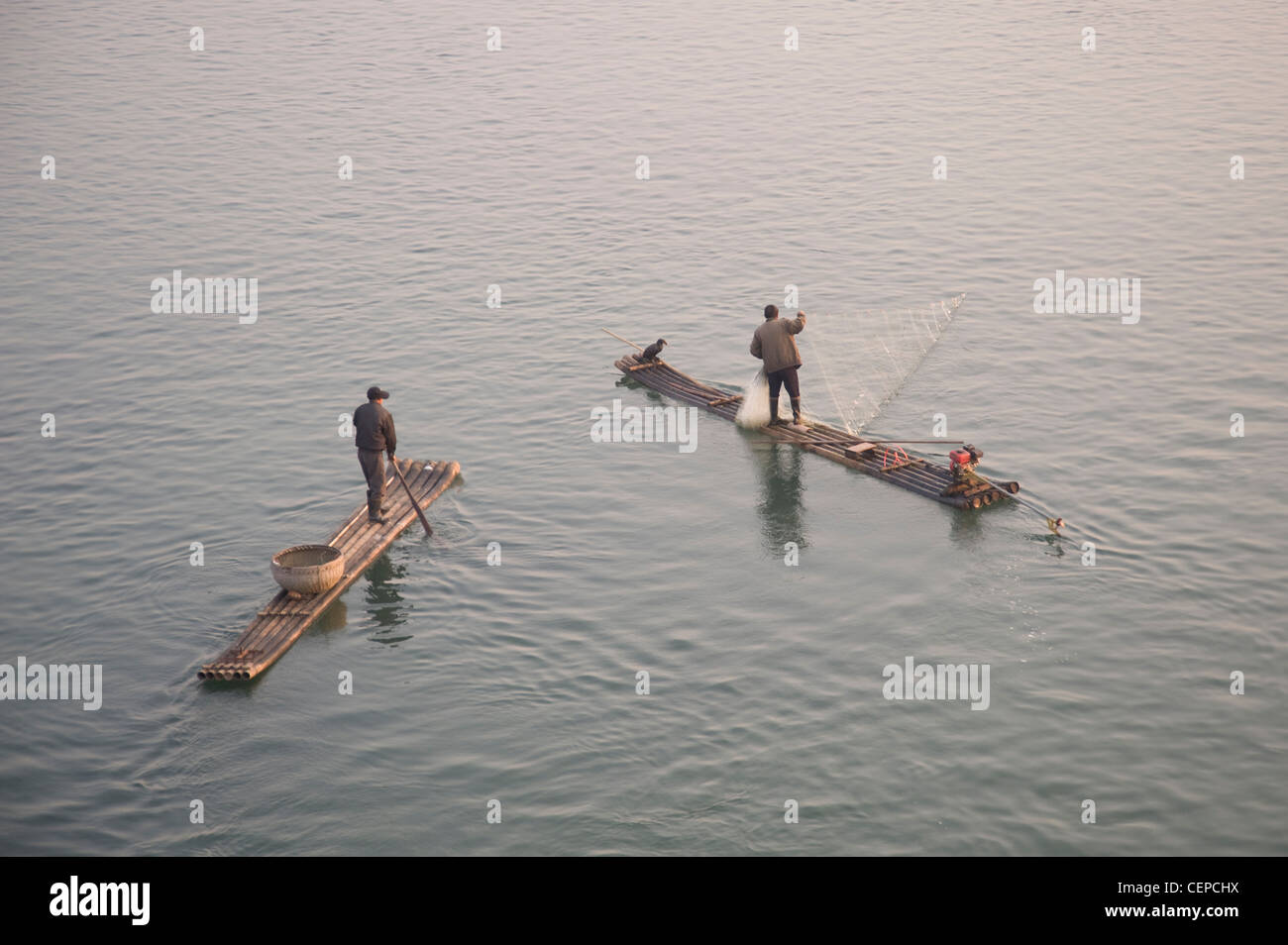 Men On A Raft Fishing Stock Photo - Alamy