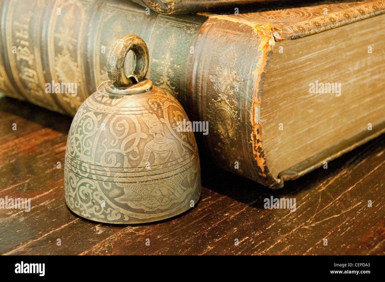 Bible and bell Stock Photo - Alamy