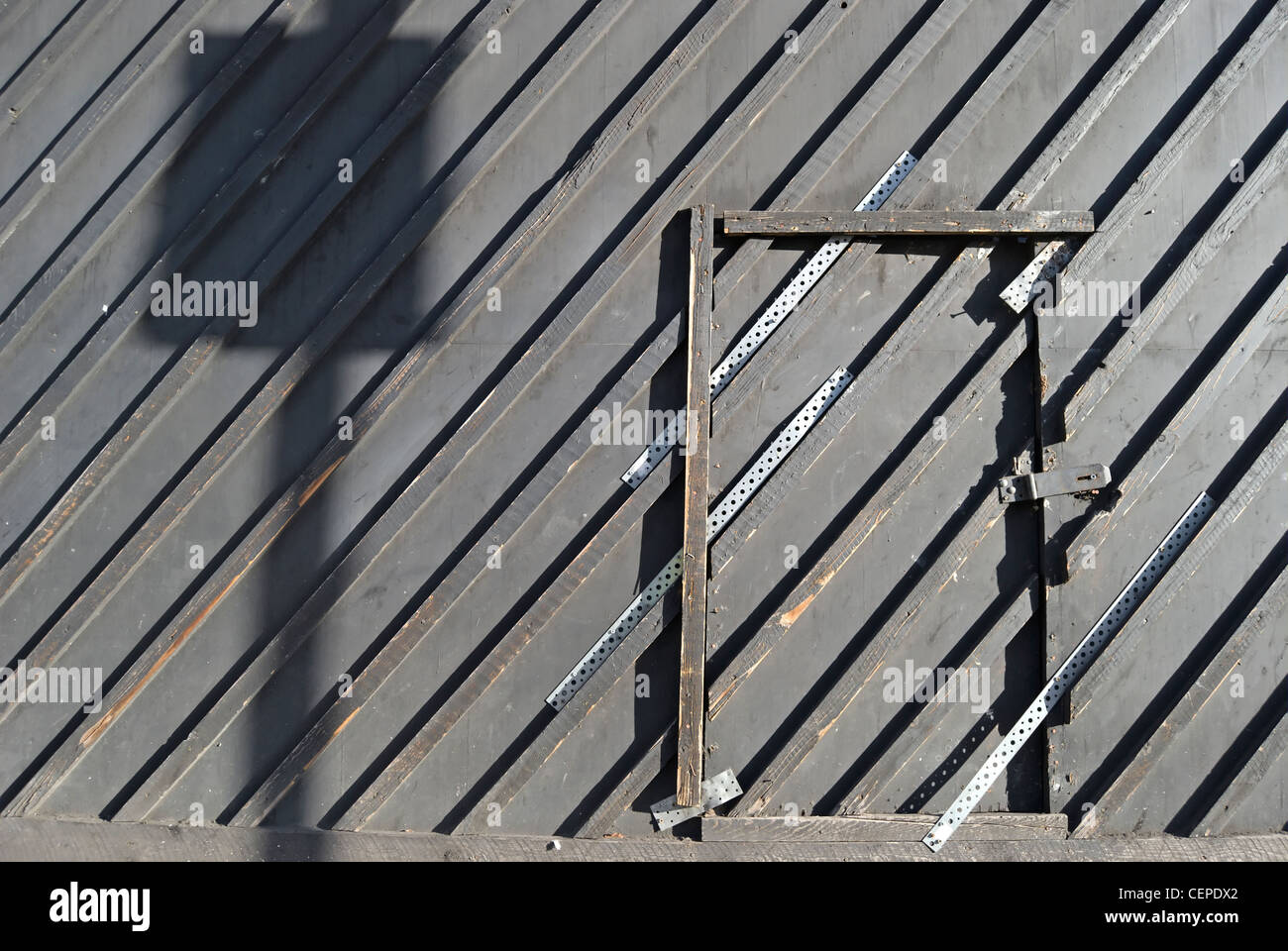 concealed temporary entrance giving workers access to a construction ...