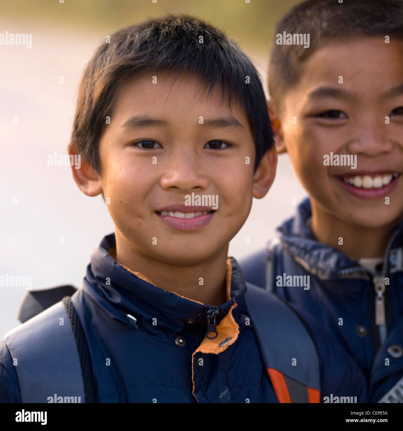 Two Young Boys Outdoors In China Stock Photo - Alamy