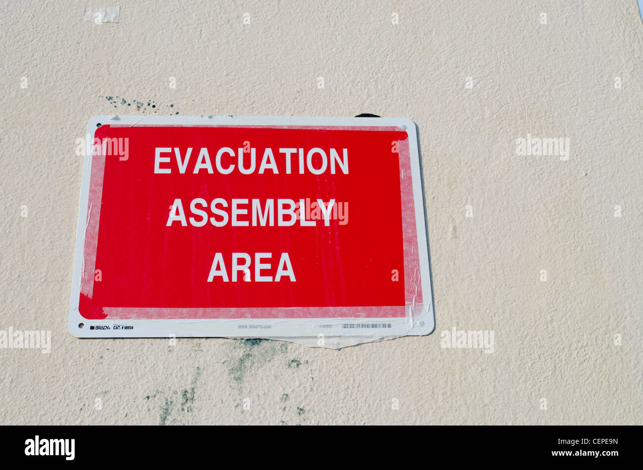 Red Evacuation Assembly Area sign taped on a wall Stock Photo - Alamy Red Evacuation Assembly Area sign taped on a wall Stock Photo - Alamy