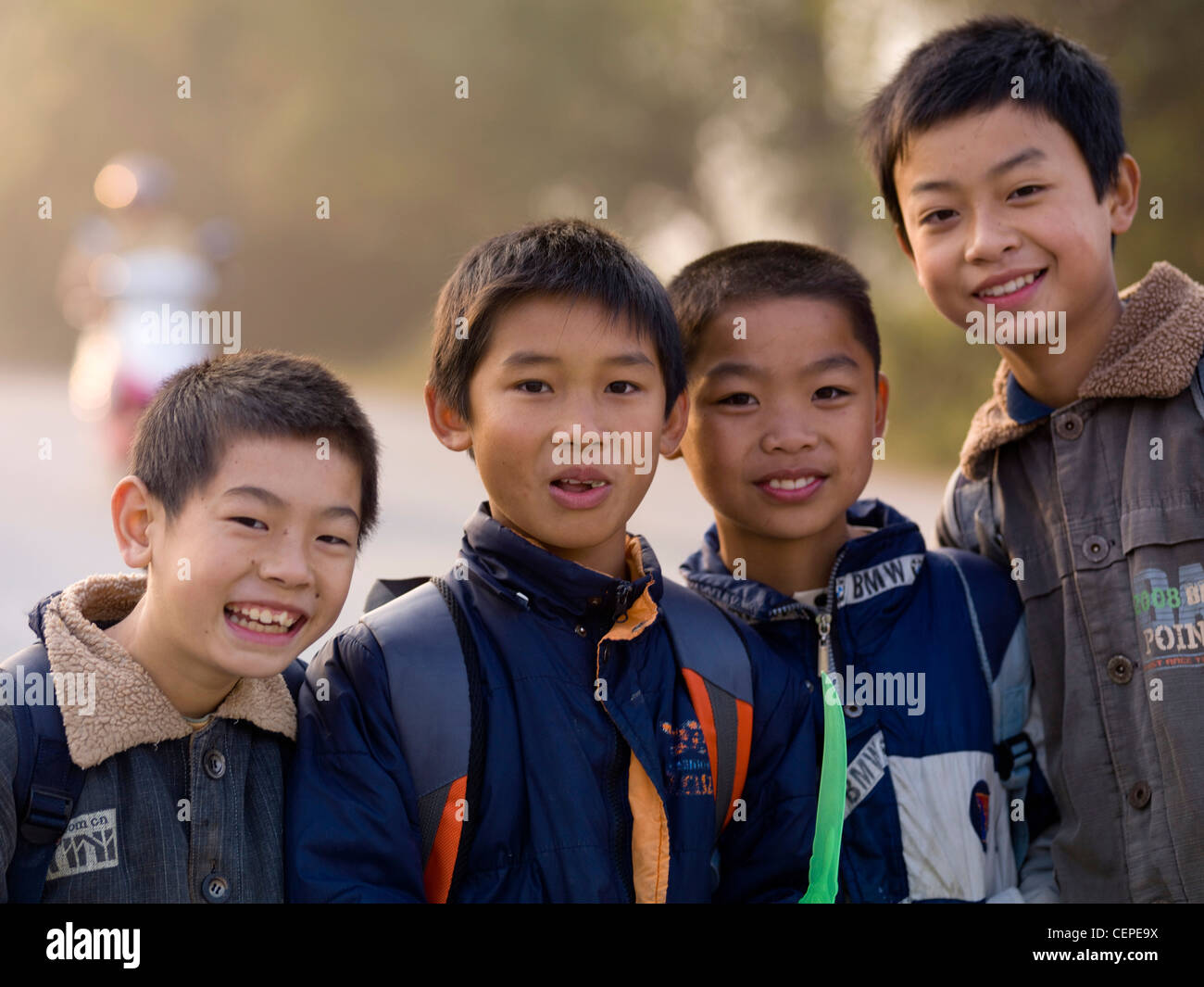 Four Young Boys Outdoors In China Stock Photo - Alamy