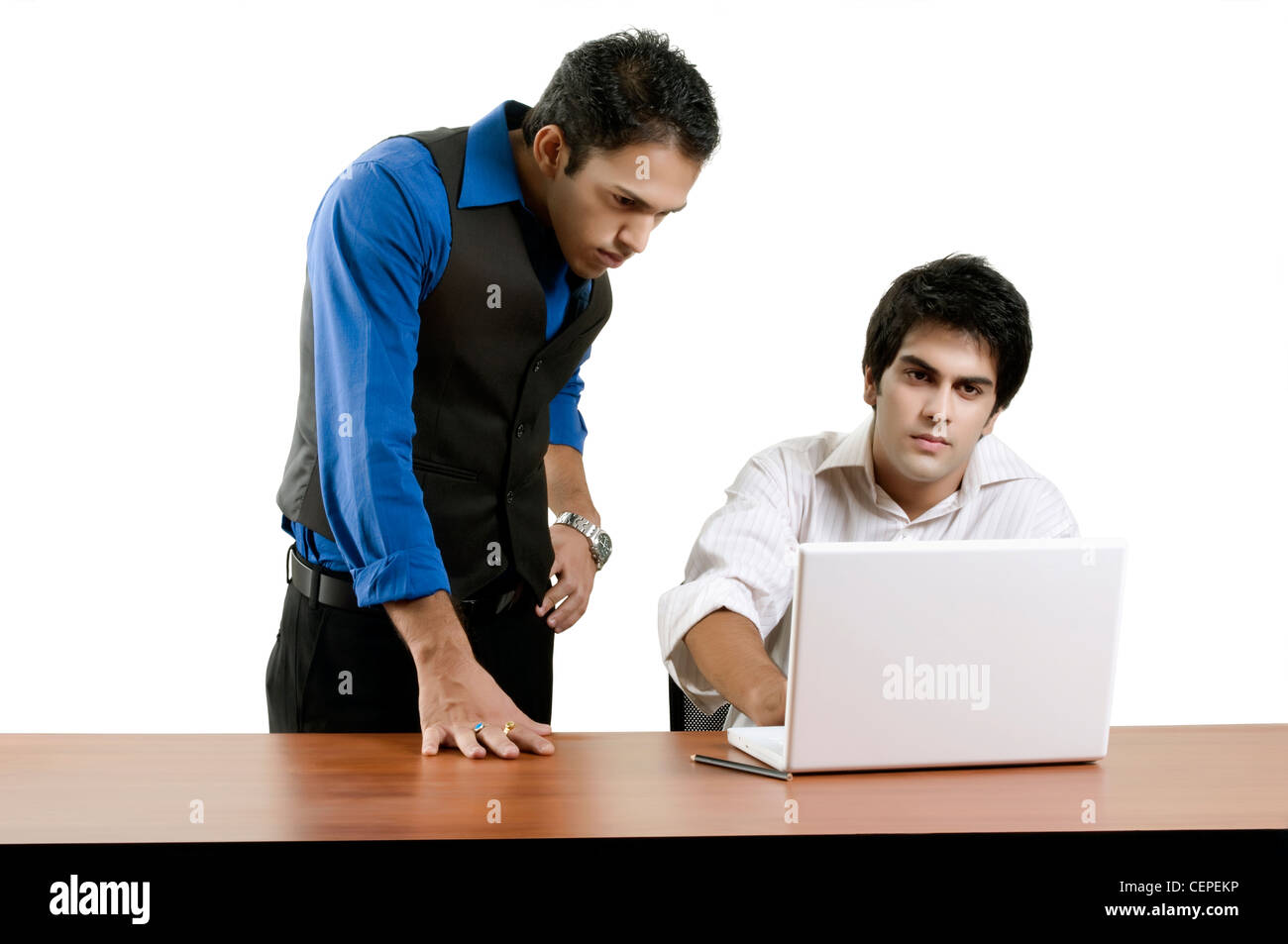 two men working Stock Photo - Alamy