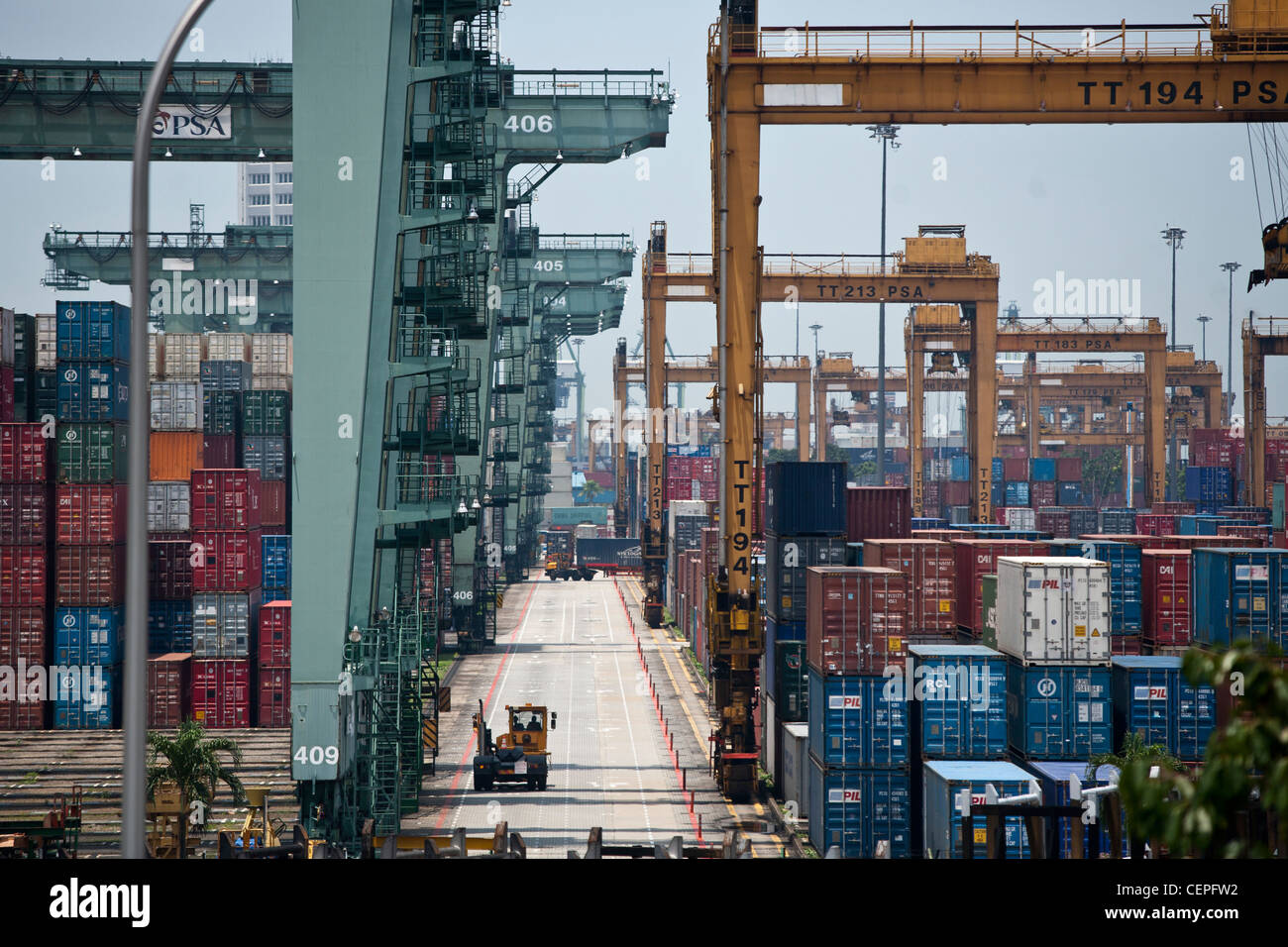 Shipping containers are seen stacked at the Port of Singapore Stock ...