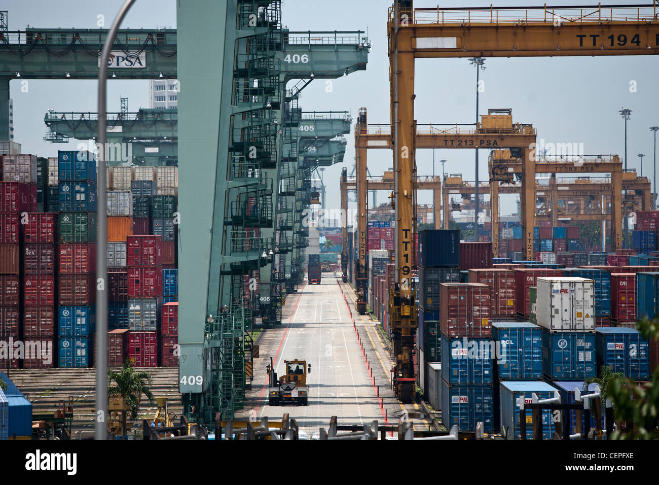 Shipping containers are seen stacked at the Port of Singapore Stock ...