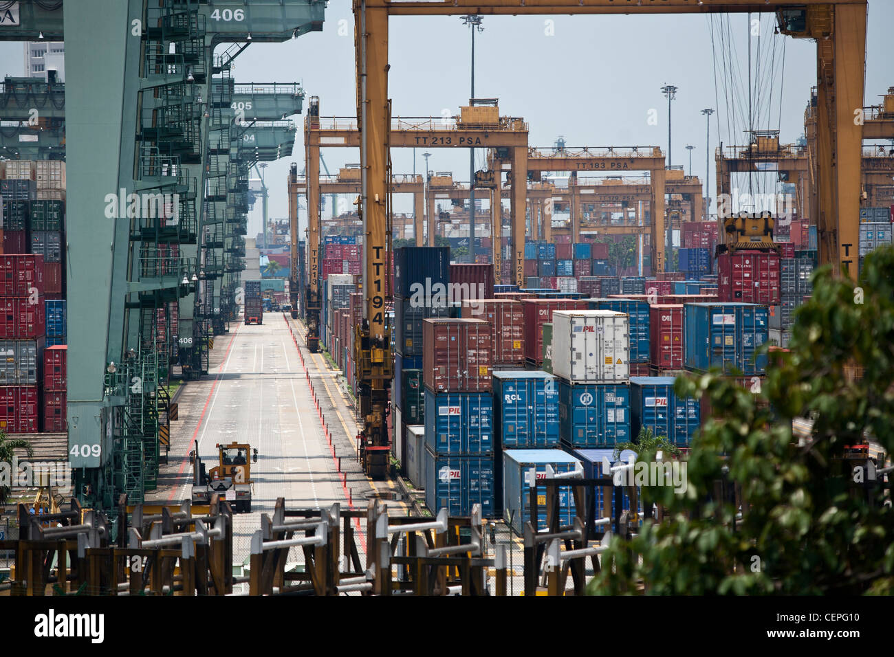 Shipping containers are seen stacked at the Port of Singapore Stock ...