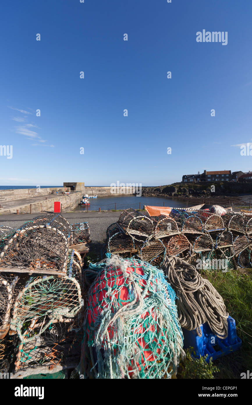fishing traps and nets on the shore; craster, northumberland, england ...