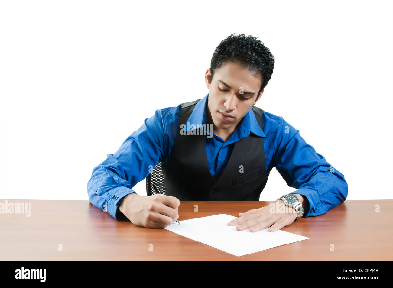 man sitting at his desk Stock Photo - Alamy
