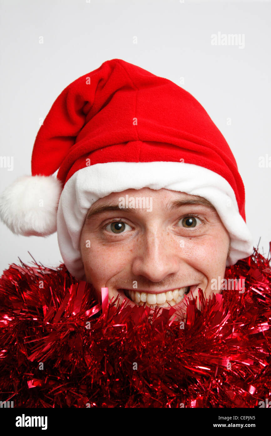 Man with christmas hat Stock Photo - Alamy