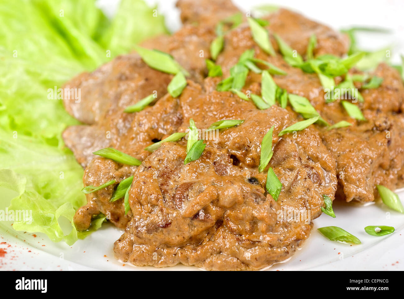 Fried liver of a rabbit stewed at sour cream Stock Photo - Alamy