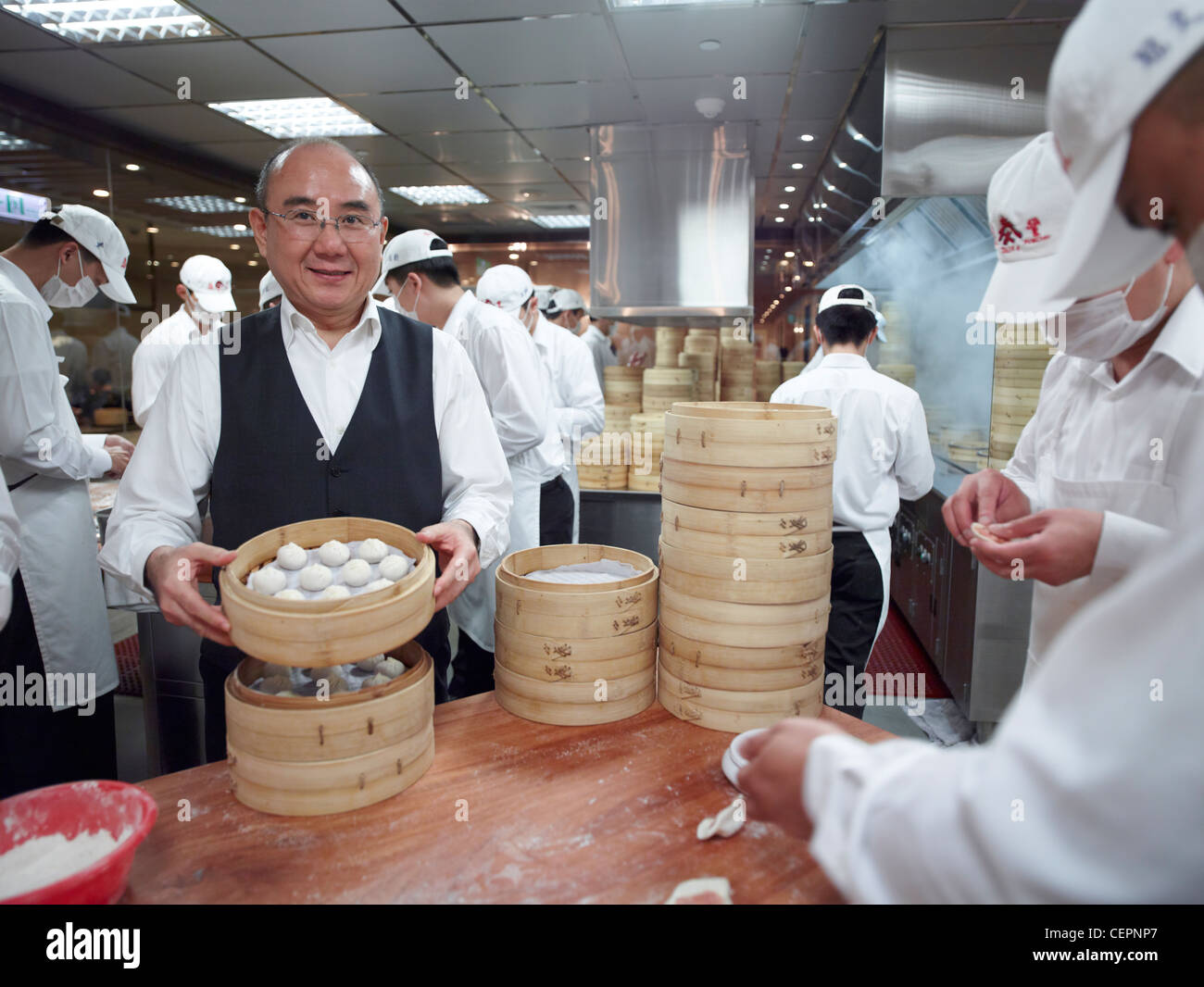 Yang Chi Hua, owner of the family run renowned dumpling franchise, Din ...