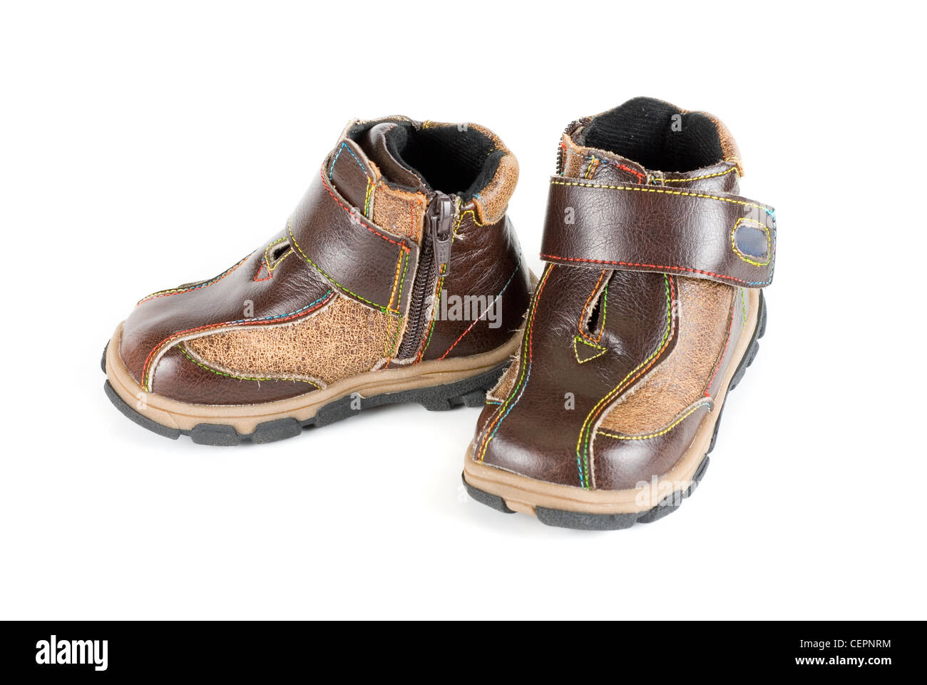 Spring baby shoes isolated on a white Stock Photo - Alamy