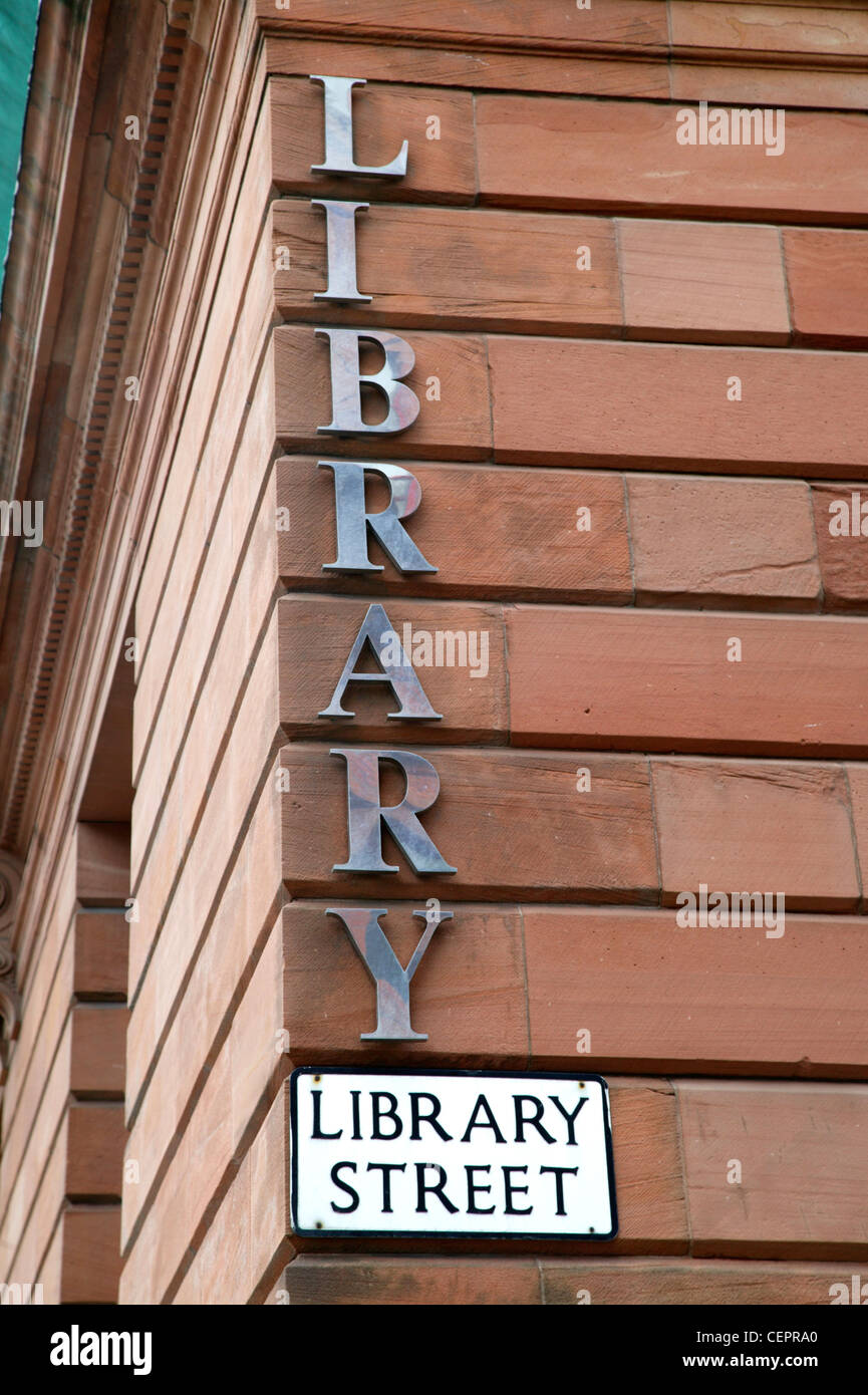 Looking up to the library sign on Library Street in Belfast Stock Photo ...