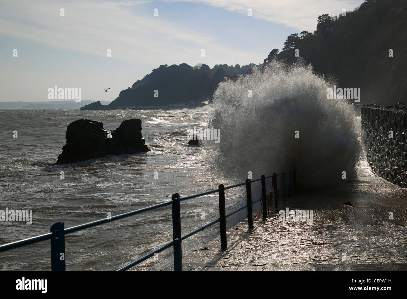 Wave breaking on sea wall hi-res stock photography and images - Alamy