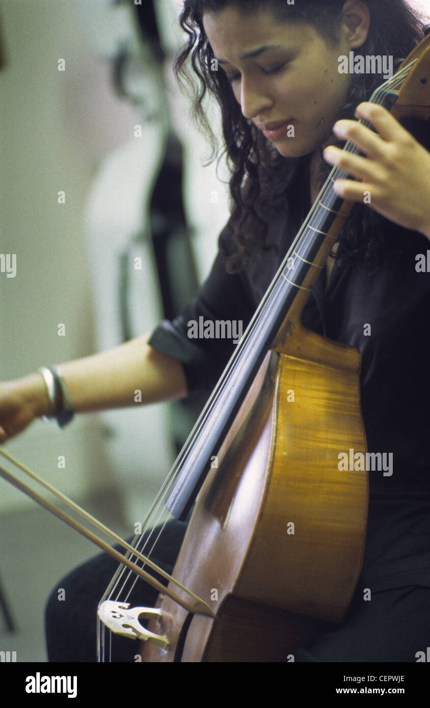 A music student practices playing the cello Stock Photo - Alamy