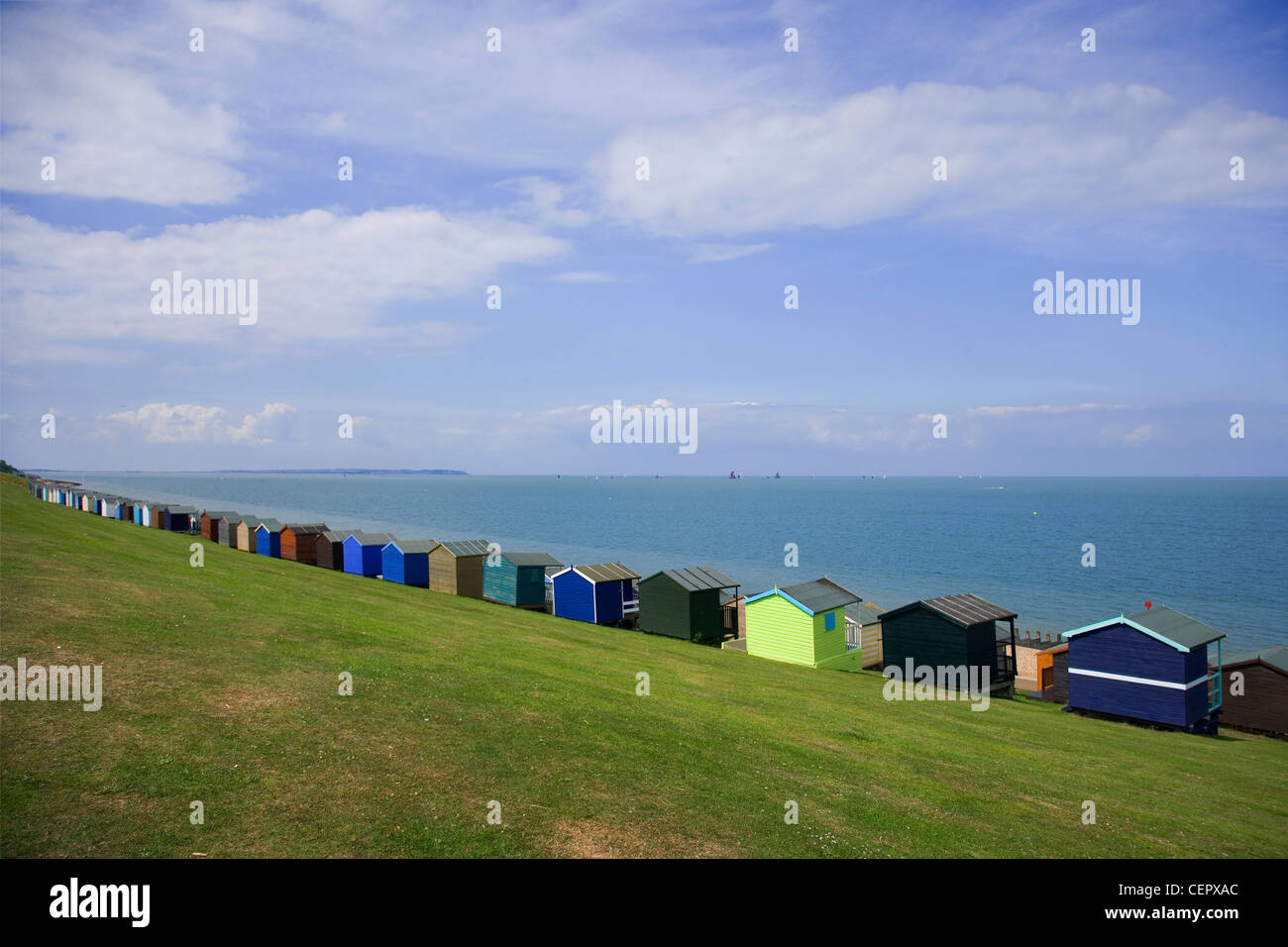 Beach huts along the seafront at Whitstable Stock Photo - Alamy