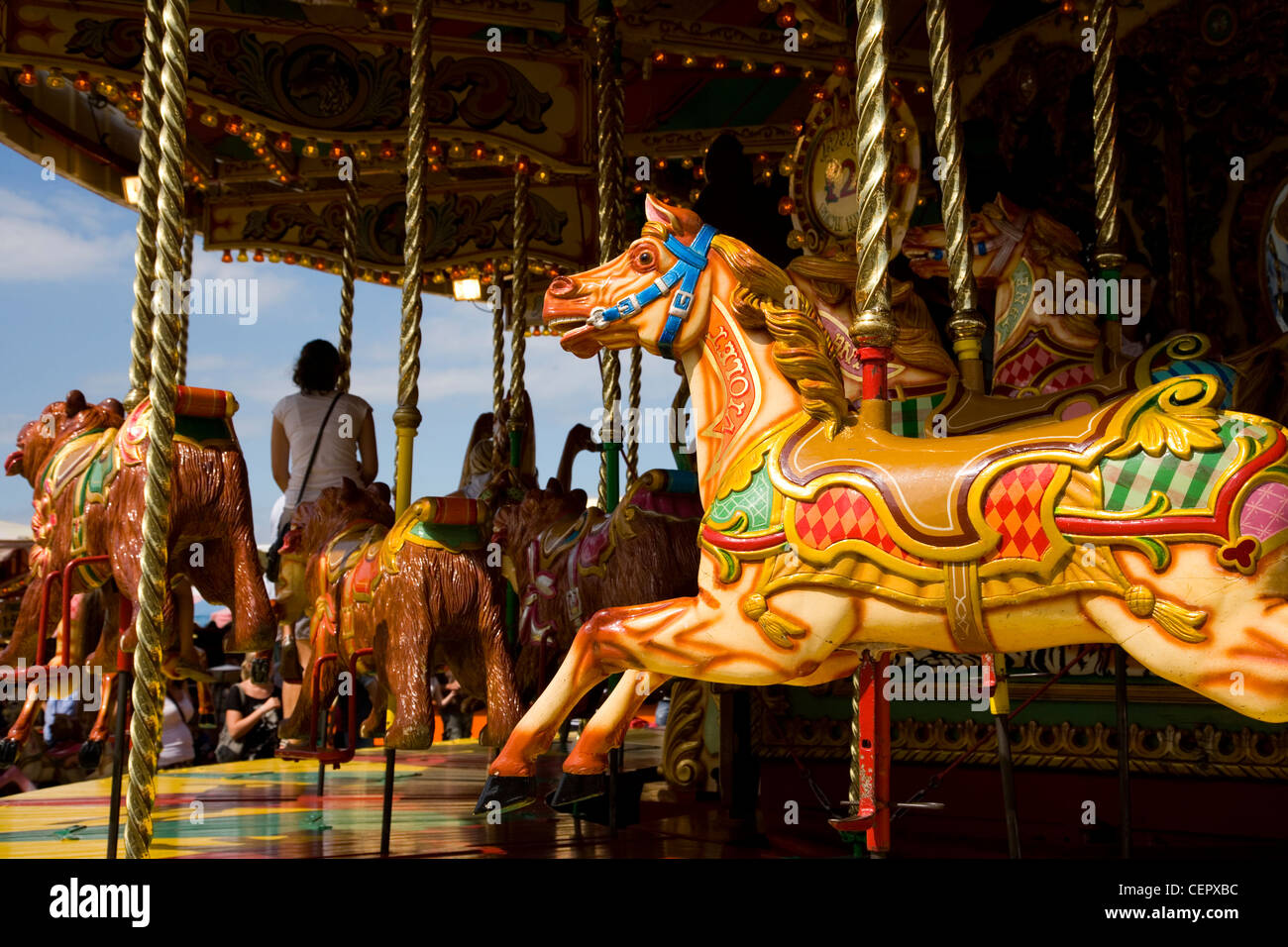 A painted horse on a traditional carousel at a fair in Whitstable Stock ...
