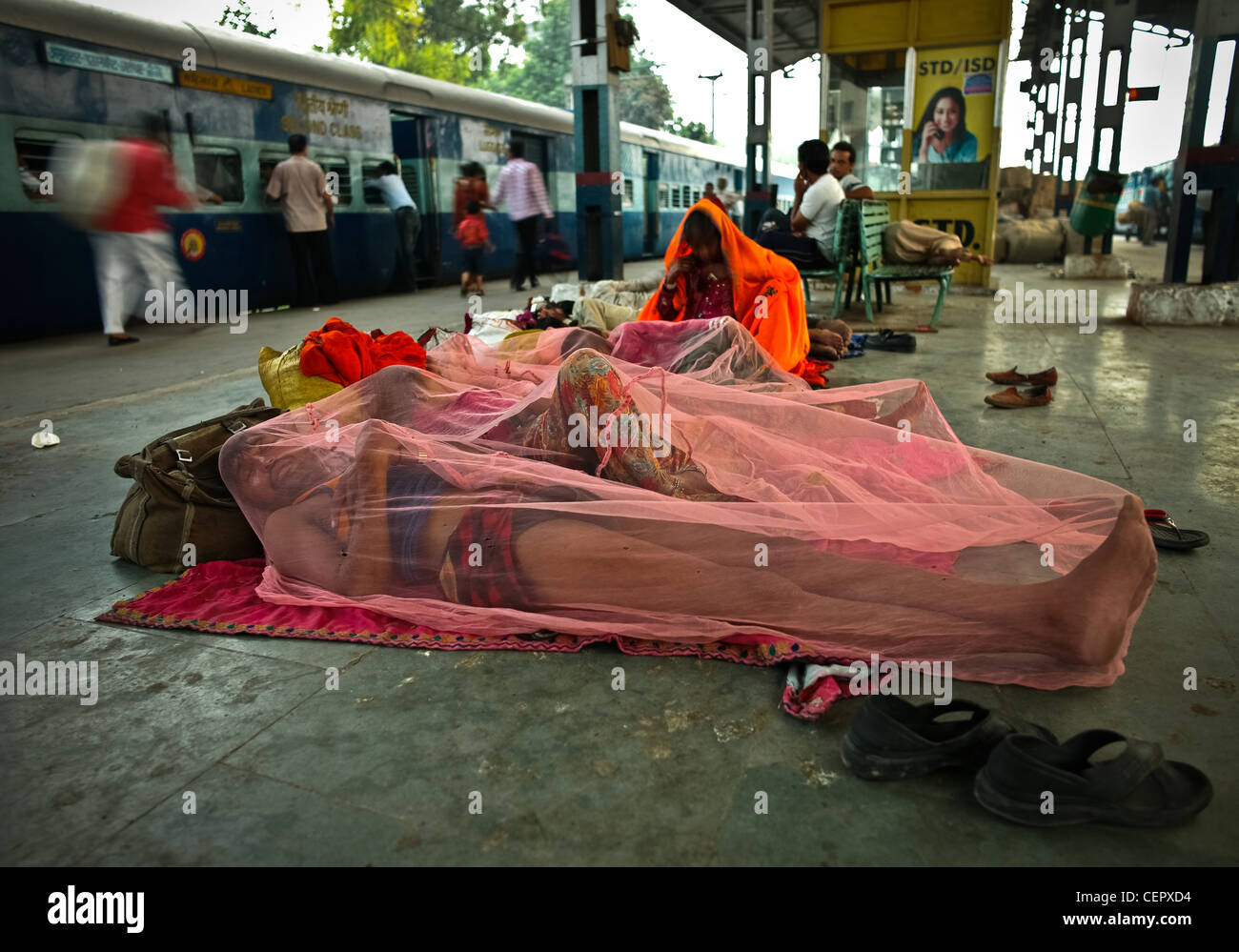Sleeping under mosquito net hi-res stock photography and images - Alamy