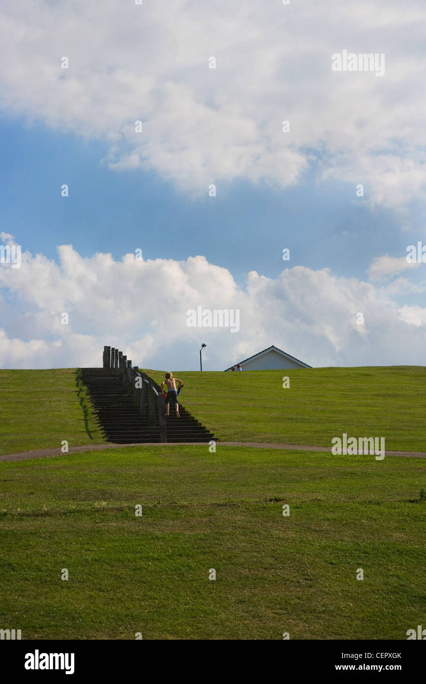 A small child running up steps at Tankerton Slopes, the area where the ...