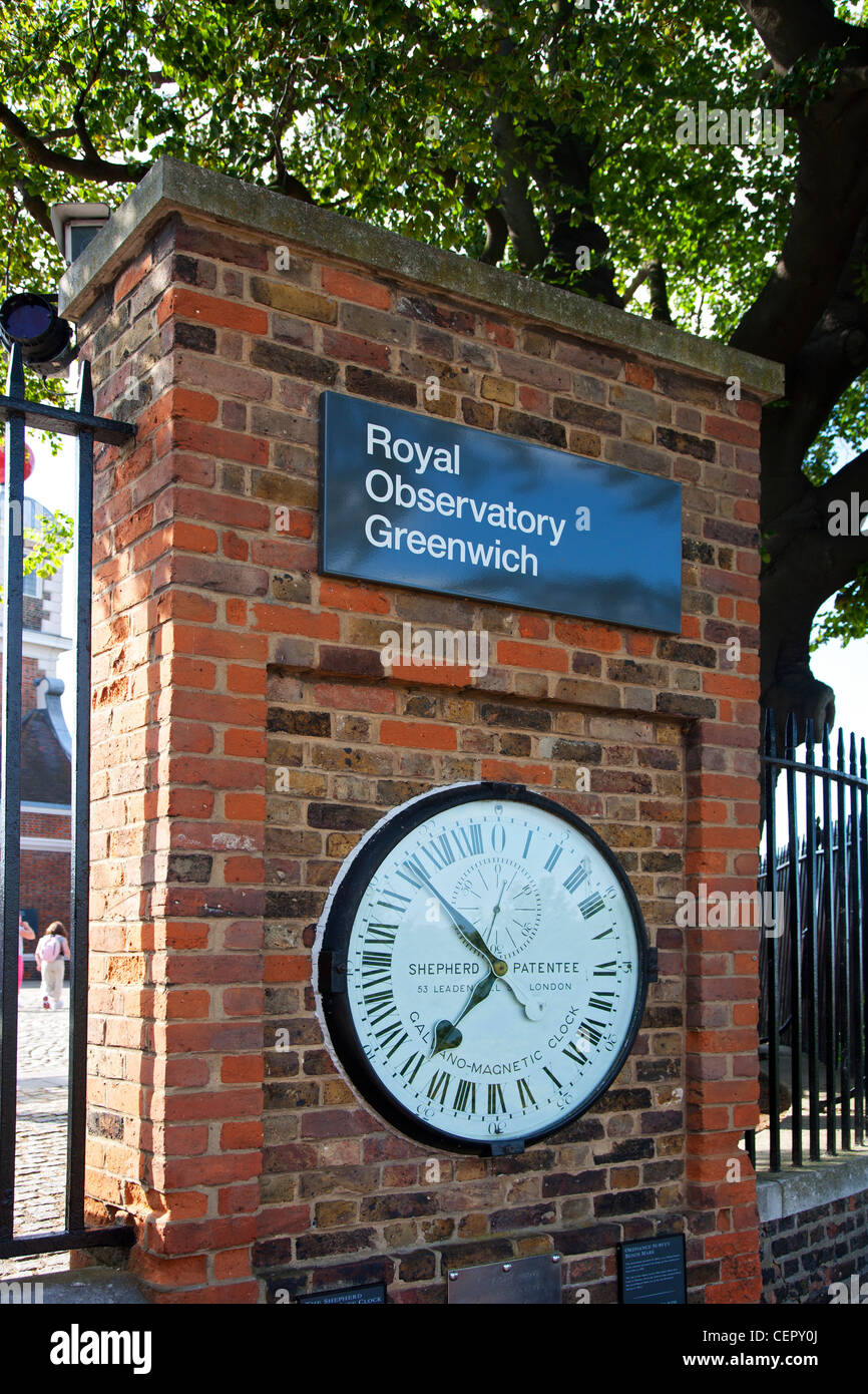 The Shepherd Gate Clock on a wall outside the Royal Observatory ...