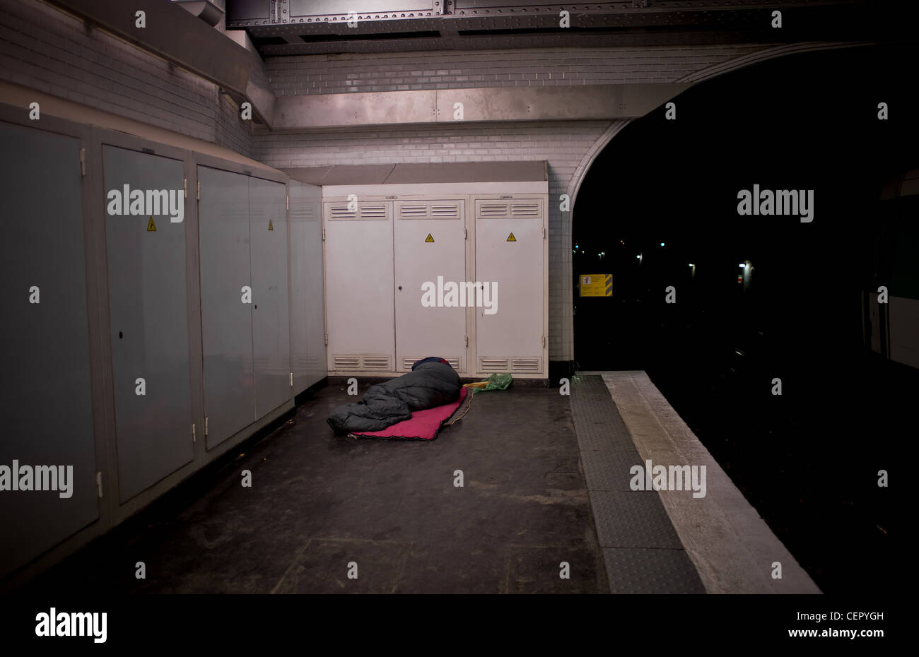Paris urban poverty, Homeless sleeping in the Paris Metro Stock Photo ...