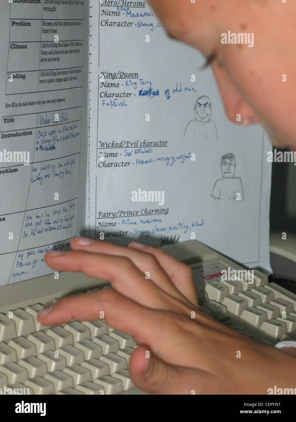 Cropped profile of boy years old with blonde hair doing homework on ...